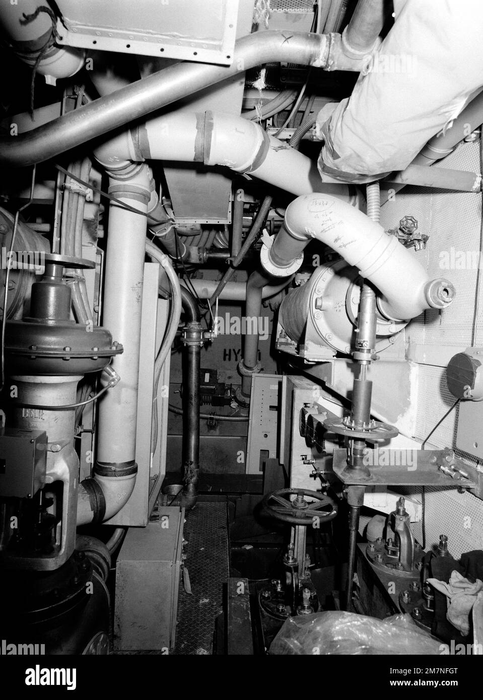 An interior view of auxiliary machine room No. 1 on the guided missile ...
