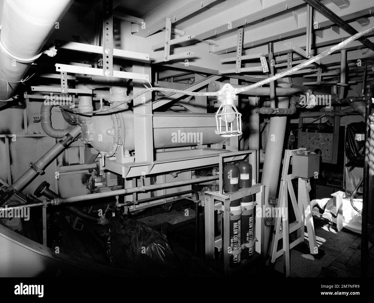 An interior view of auxiliary machine room No. 2 on the guided missile ...