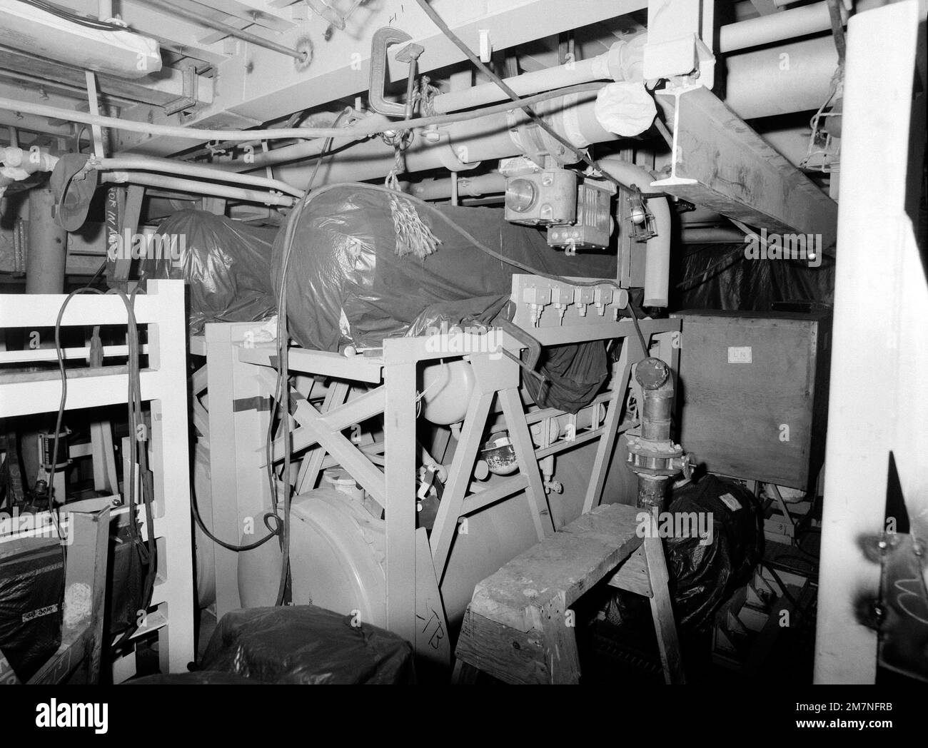 A interior view of auxiliary machine room No. 2 on the guided missile ...