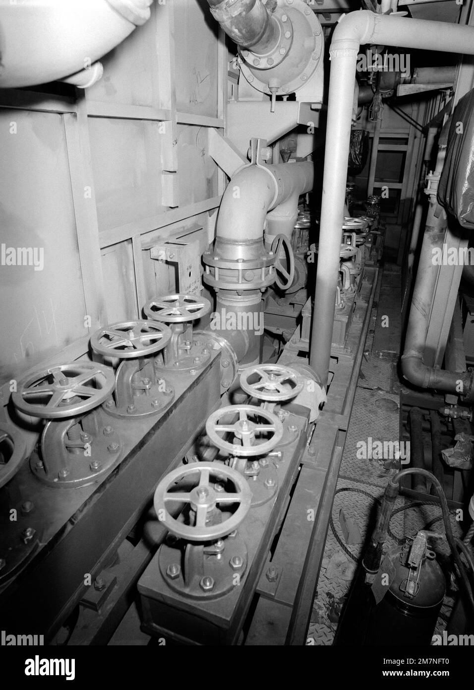 An interior view of auxiliary machine room No. 1 on the guided missile ...