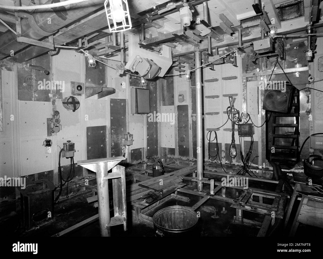 An interior view of the combat information center on the guided missile ...