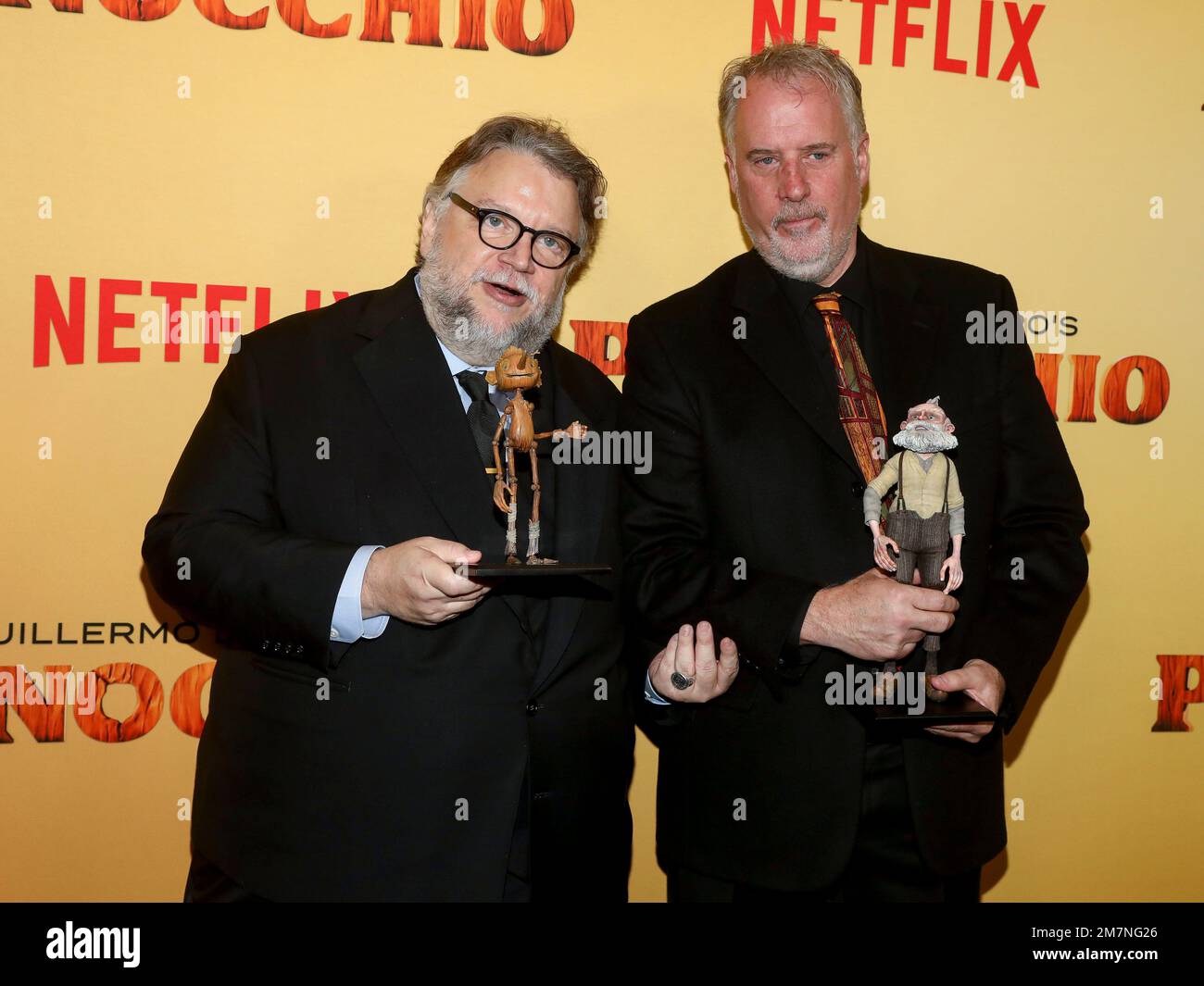 Directors Guillermo del Toro, left, and Mark Gustafson, right, attend ...