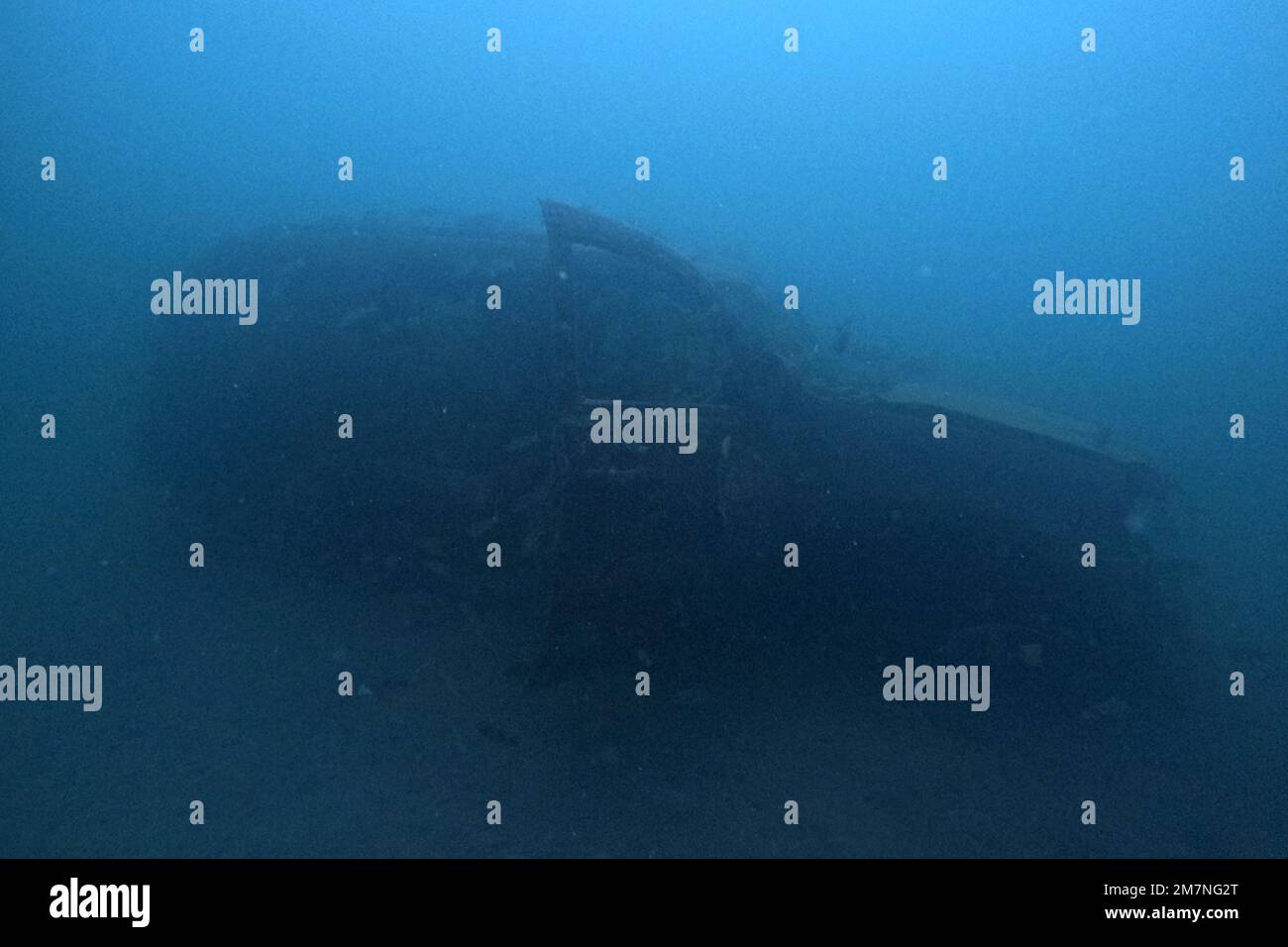 A sunken vehicle sit in the Mesaieed sea-line at the GMC dive site in ...