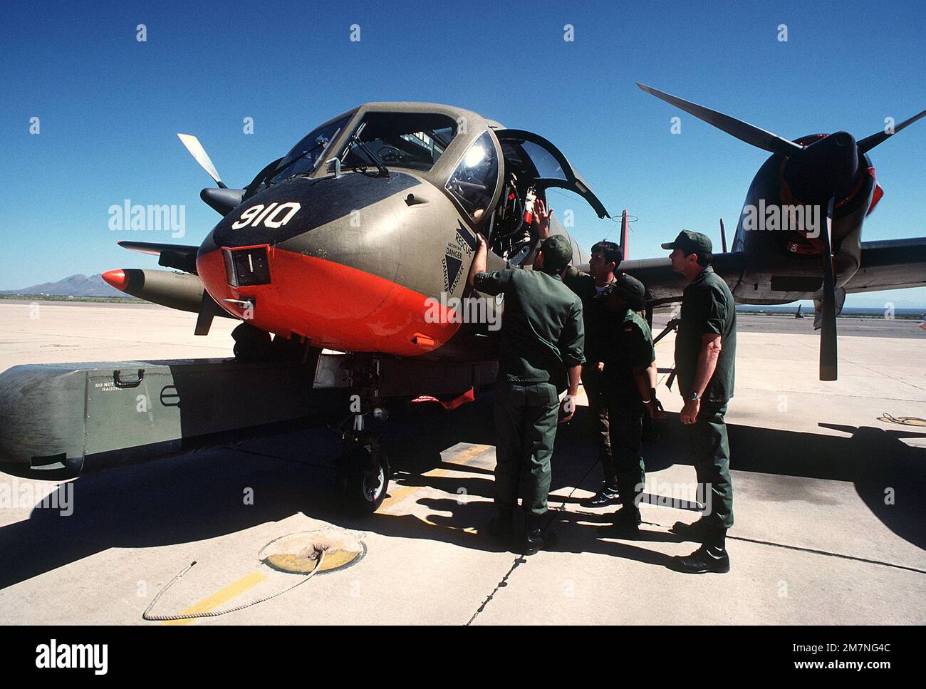 A left front view of an OV-1D Mohawk aircraft equipped with an APS-94 ...