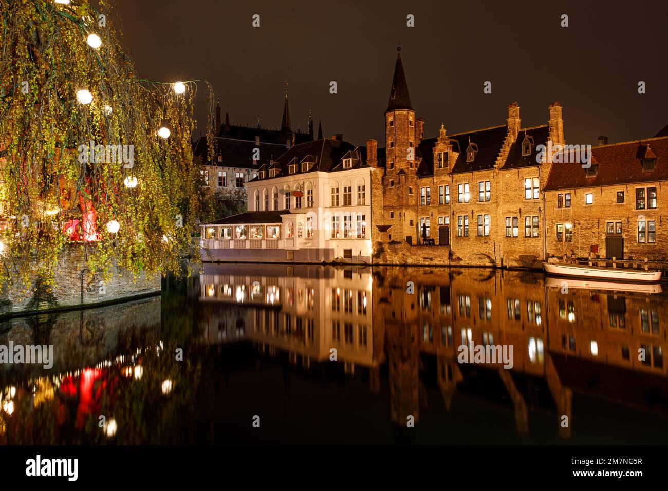 Medieval buildings in Bruges, Belgium old town Brugge illuminated at ...