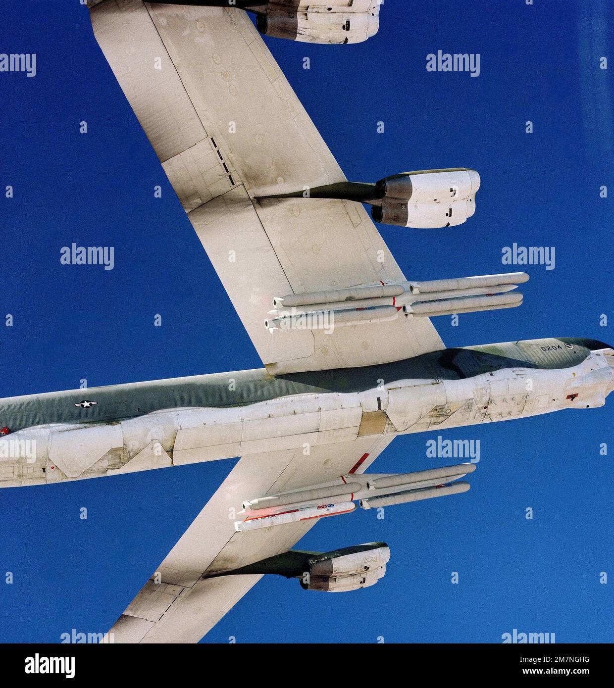 Bottom view of a B-52 Stratofortress aircraft carrying AGM-109 Tomahawk ...