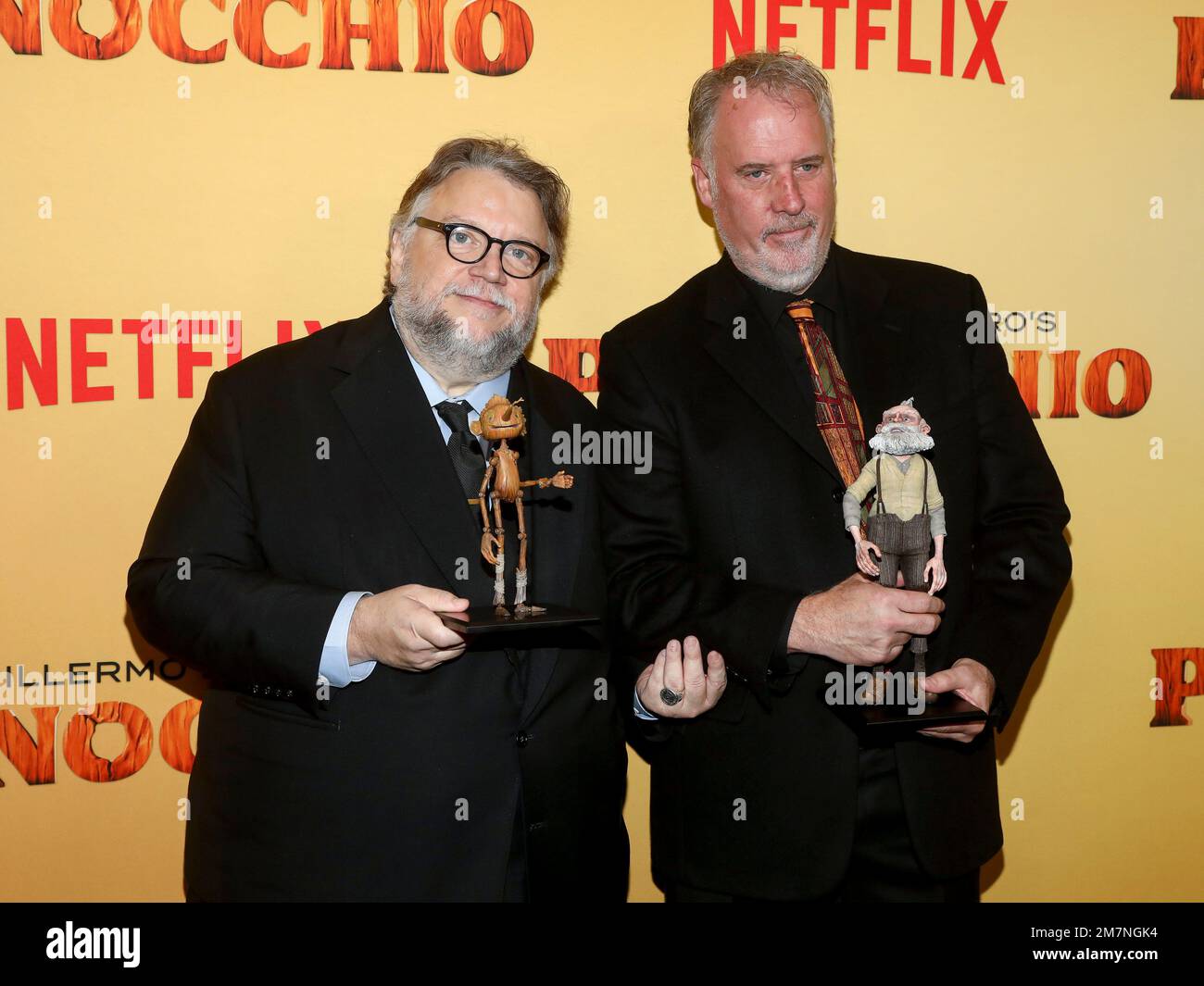 Directors Guillermo del Toro, left, and Mark Gustafson, right, attend ...