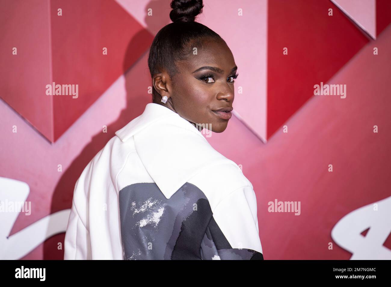 Dina Asher-Smith poses for photographers upon arrival at the British ...