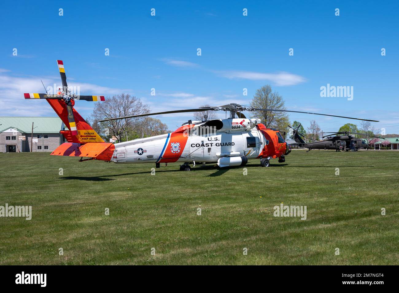 A U.S. Coast Guard MH-60T Jayhawk and a Connecticut Army National Guard ...