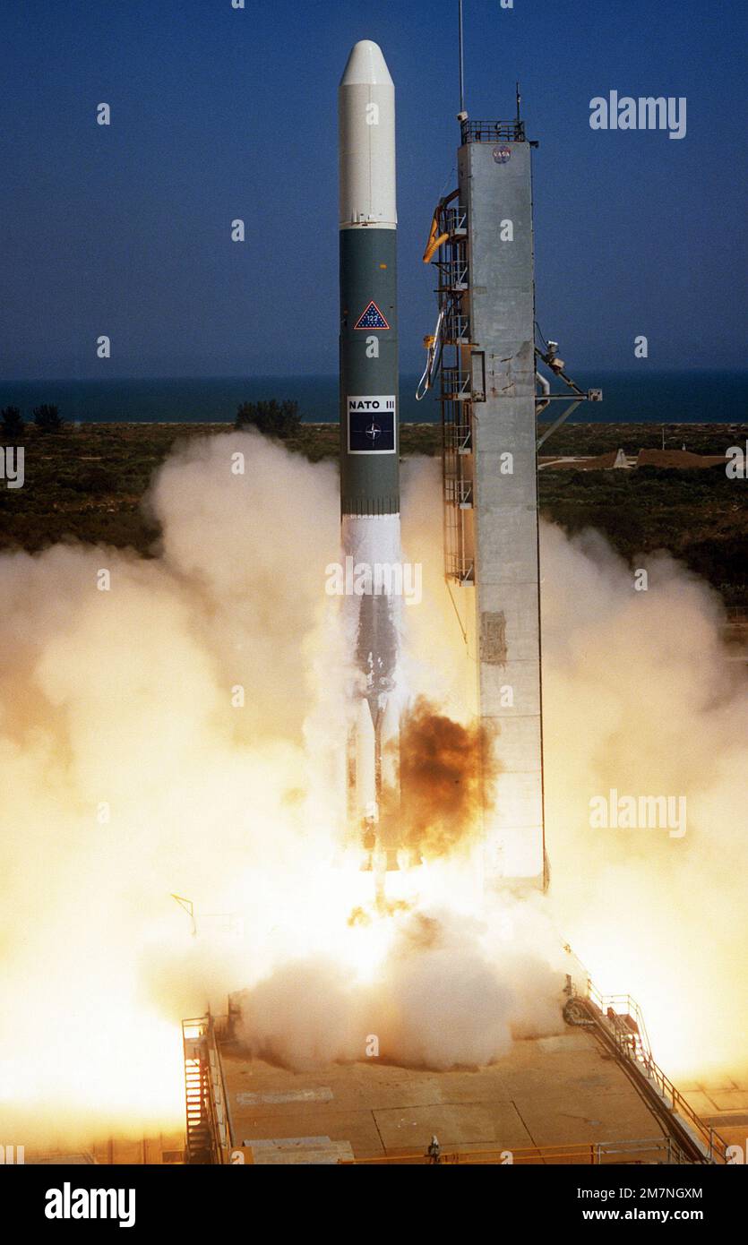 A Delta launch vehicle lifts off with a NATO III satellite aboard. Base ...