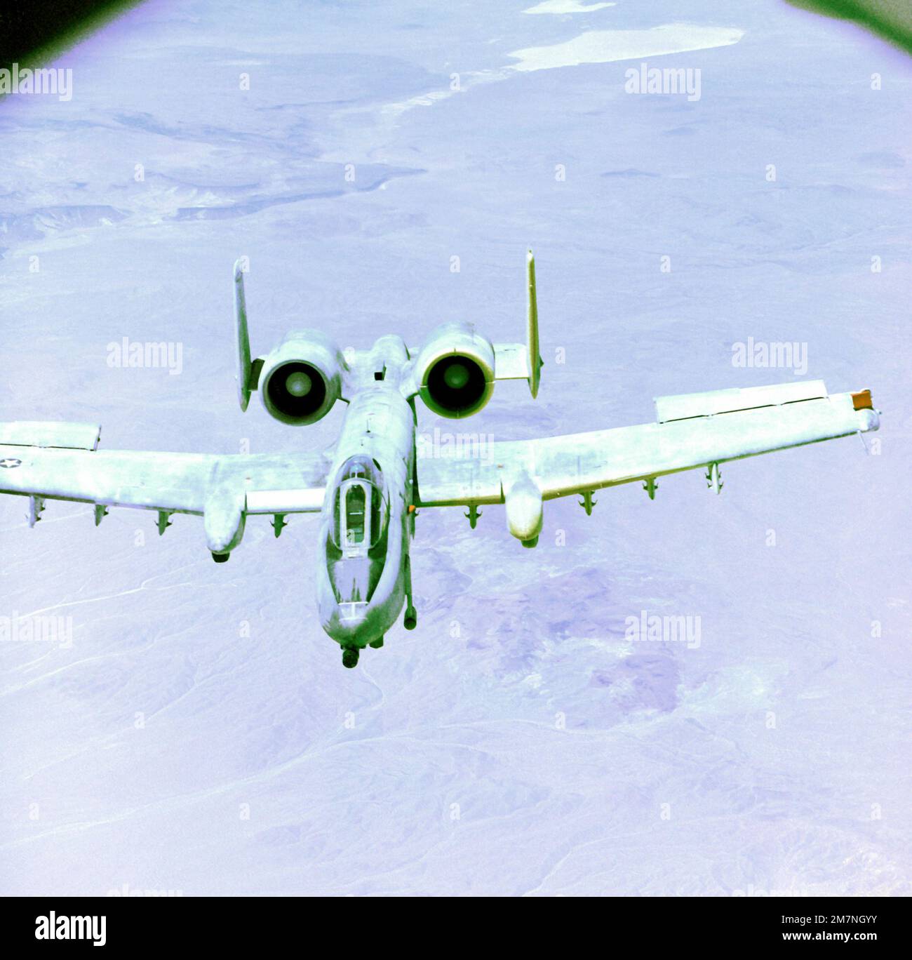 An overhead front view of an A-10 Thunderbolt II aircraft in flight ...