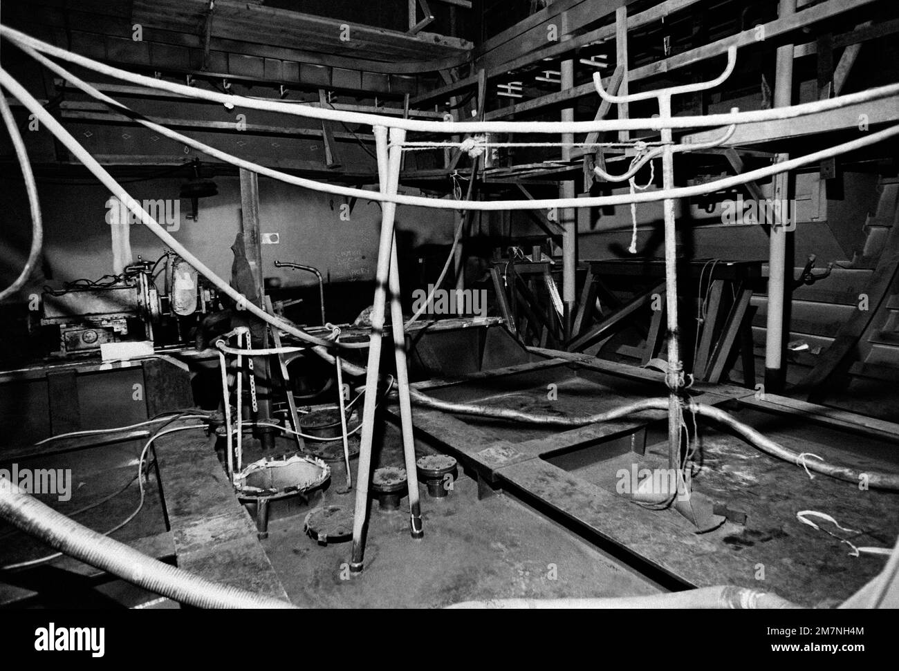 An interior view of the engine room on the guided missile frigate USS ...