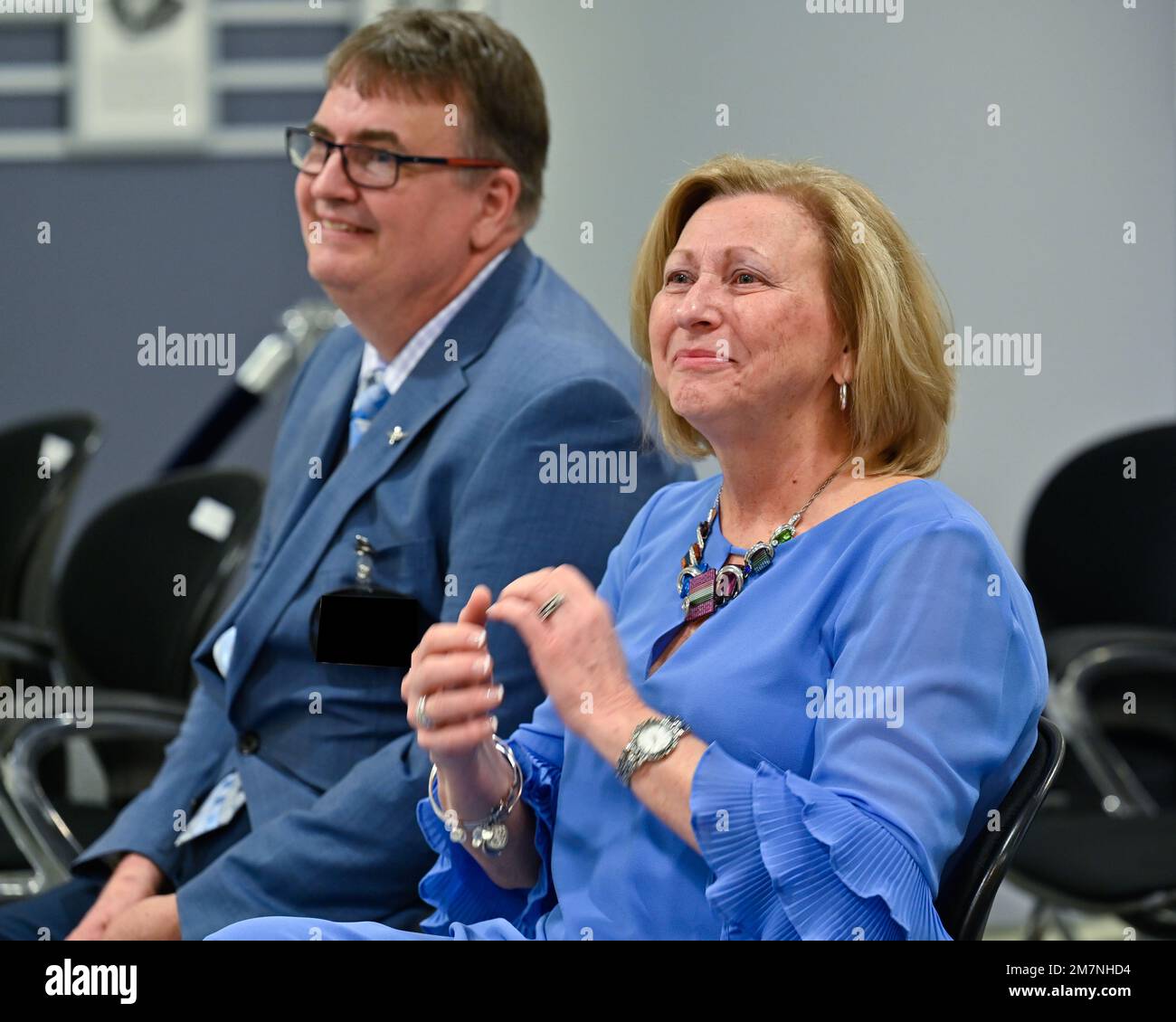 Lisa and Daniel Bye, the parents of Air Force Capt. Taylor Bye, listen ...