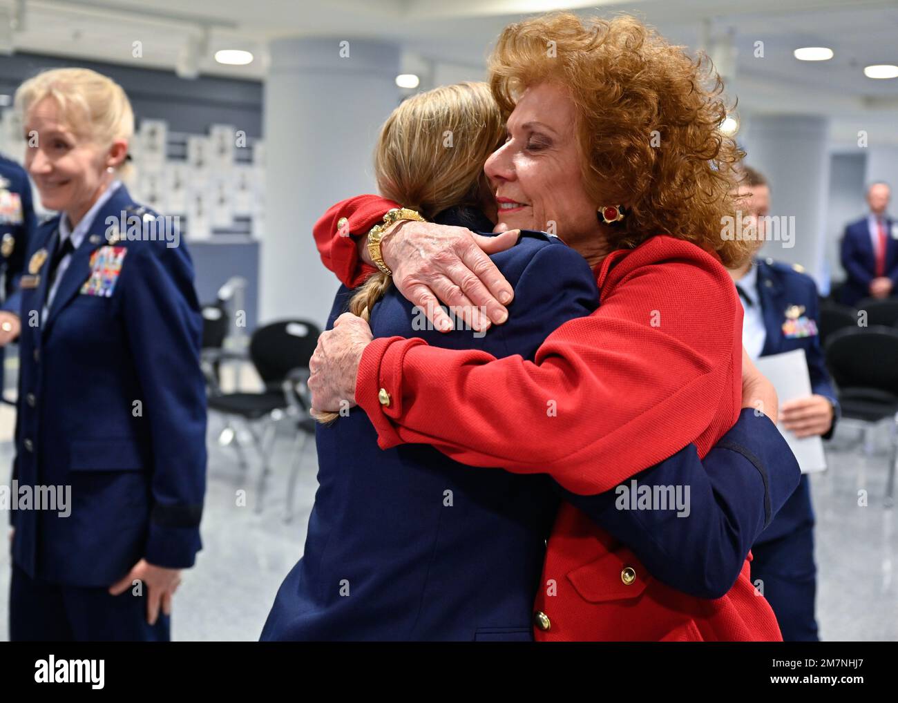 A member of the Kolligian family embraces Air Force Capt. Taylor Bye ...