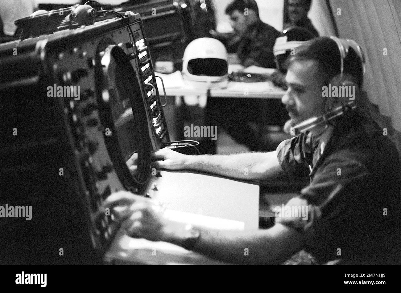 SSGT Davis of the Tactical Air Command Center is in radio contact with ...