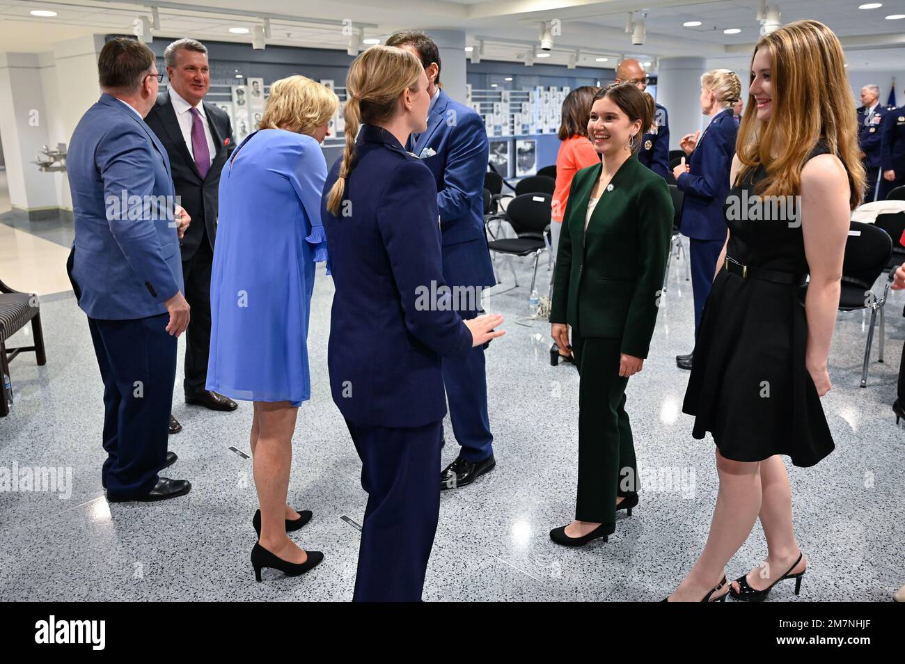 Guests congratulate Air Force Capt. Taylor Bye after a ceremony at the ...