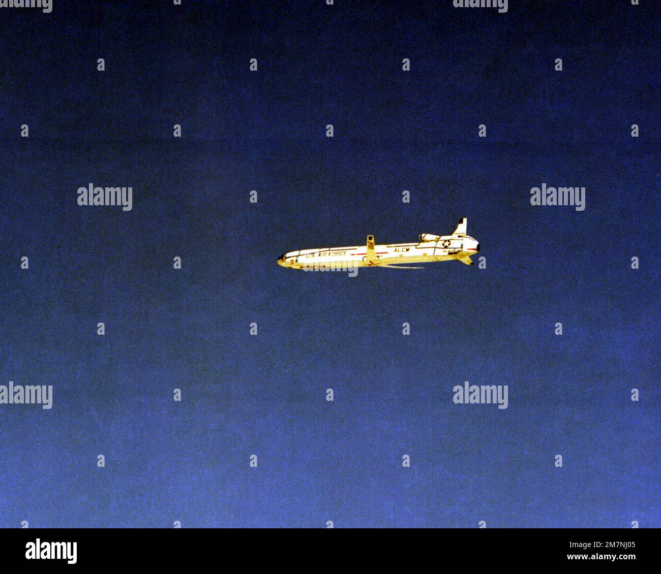 A side view of an AGM-86 air-launched cruise missile in flight after ...