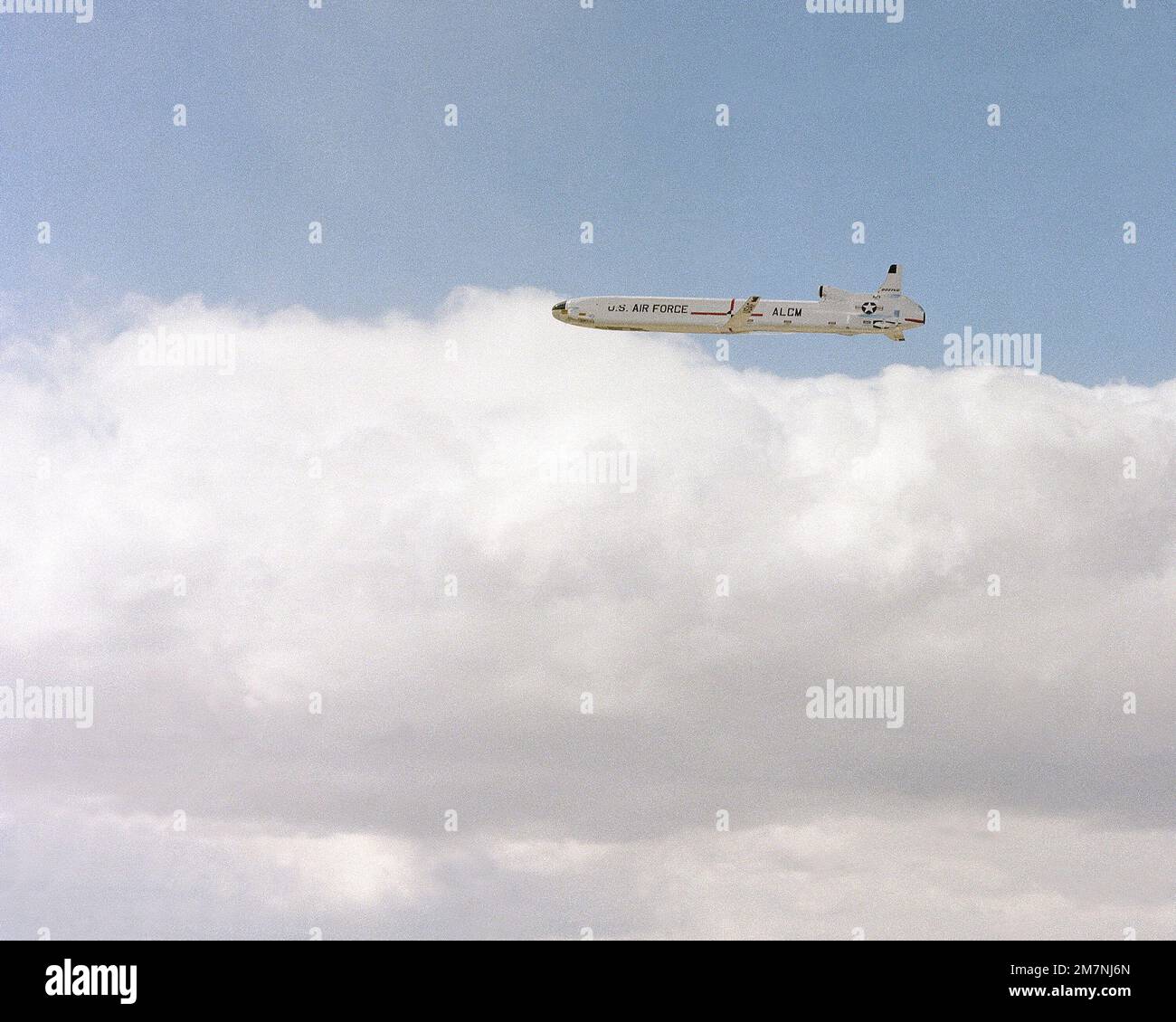 A side view of an AGM-86 air-launched cruise missile in flight after ...