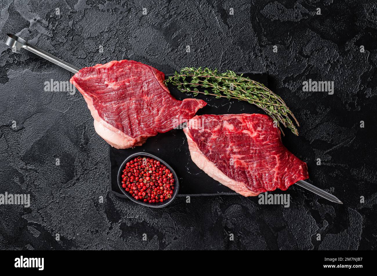 Raw dry aged wagyu picanha barbecue skewer from the cap rump beef with ...
