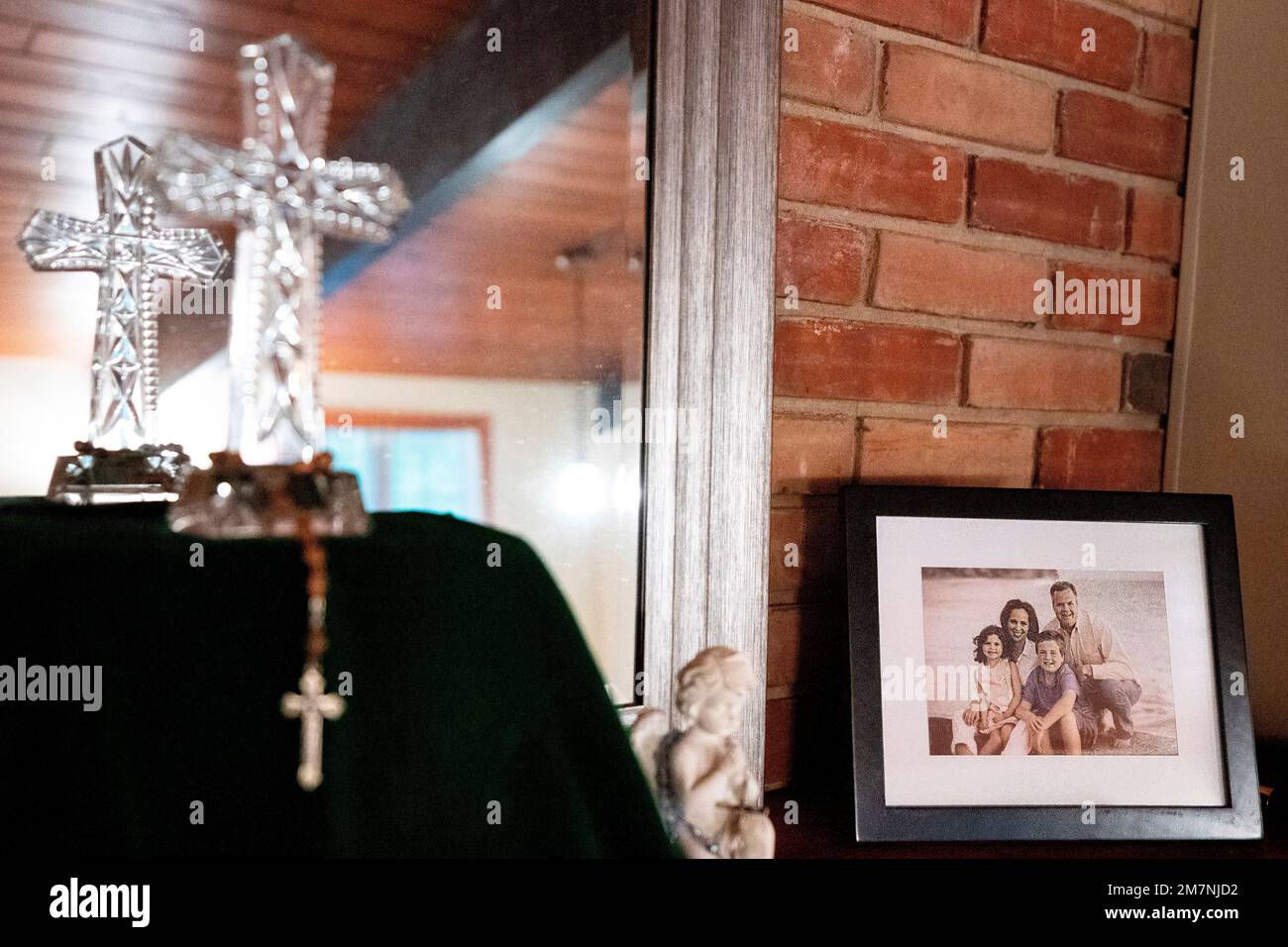 A family photo is displayed in Brenda and Brian Lilly's home, Thursday ...