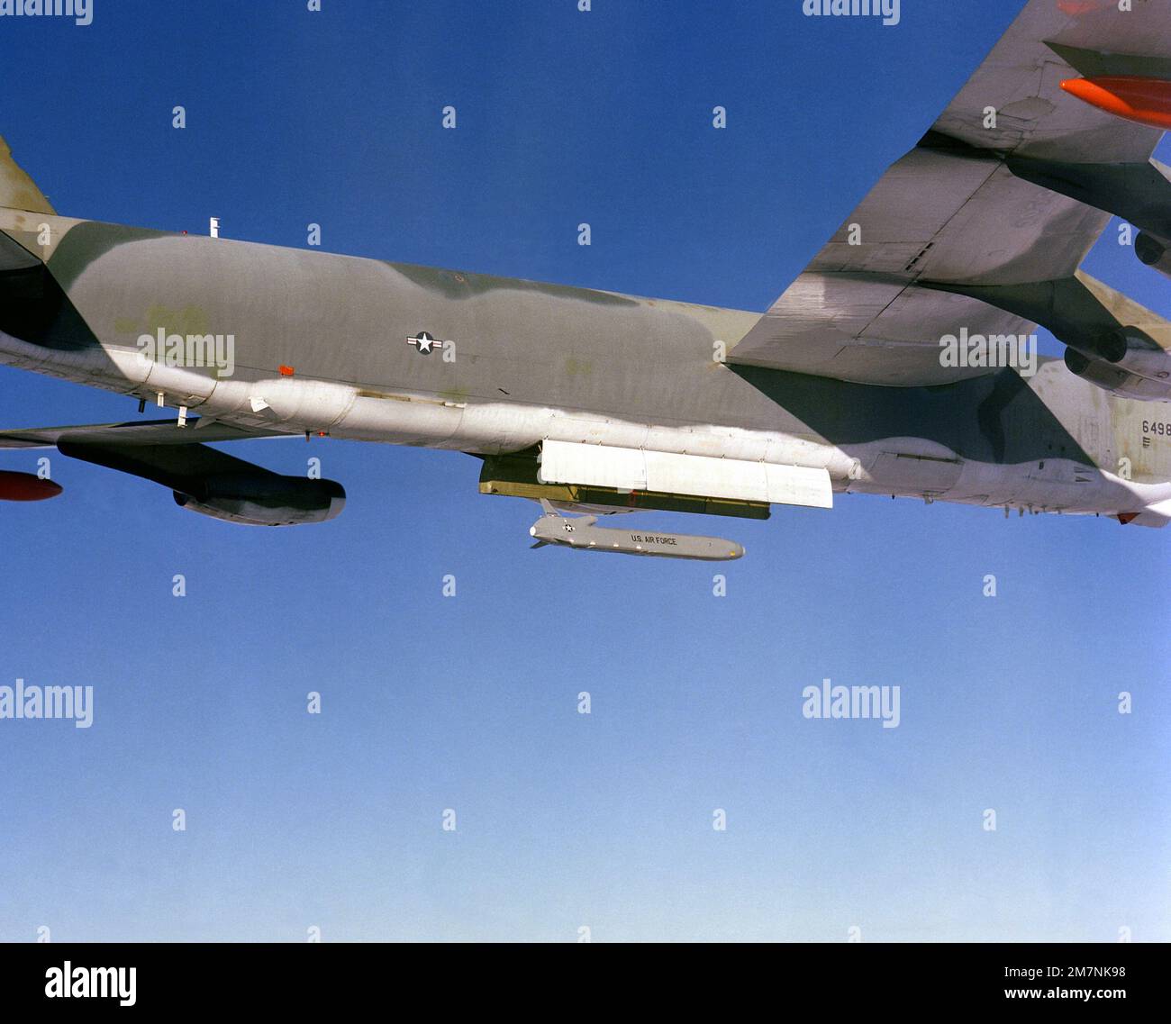 An AGM-86 air-launched cruise missile (ALCM) is being released on a B ...