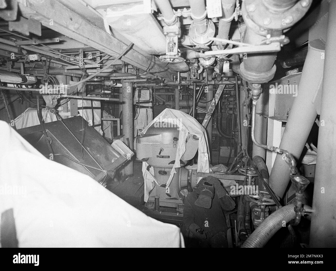 An interior view of auxiliary machine room No. 2 on the guided missile ...
