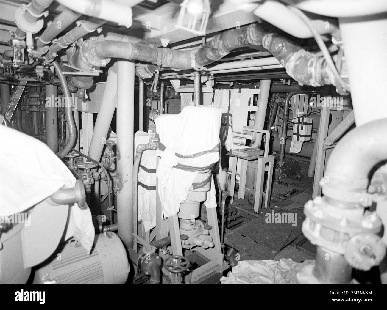 An interior view of auxiliary machine room No. 2 on the guided missile ...
