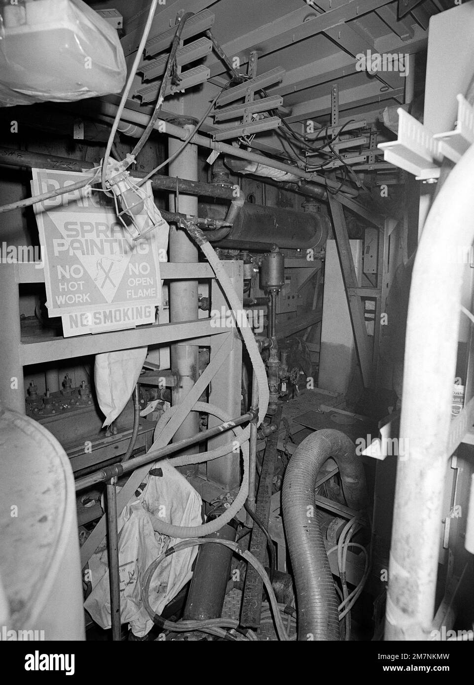An interior view of auxiliary machine room No. 3 on the guided missile ...