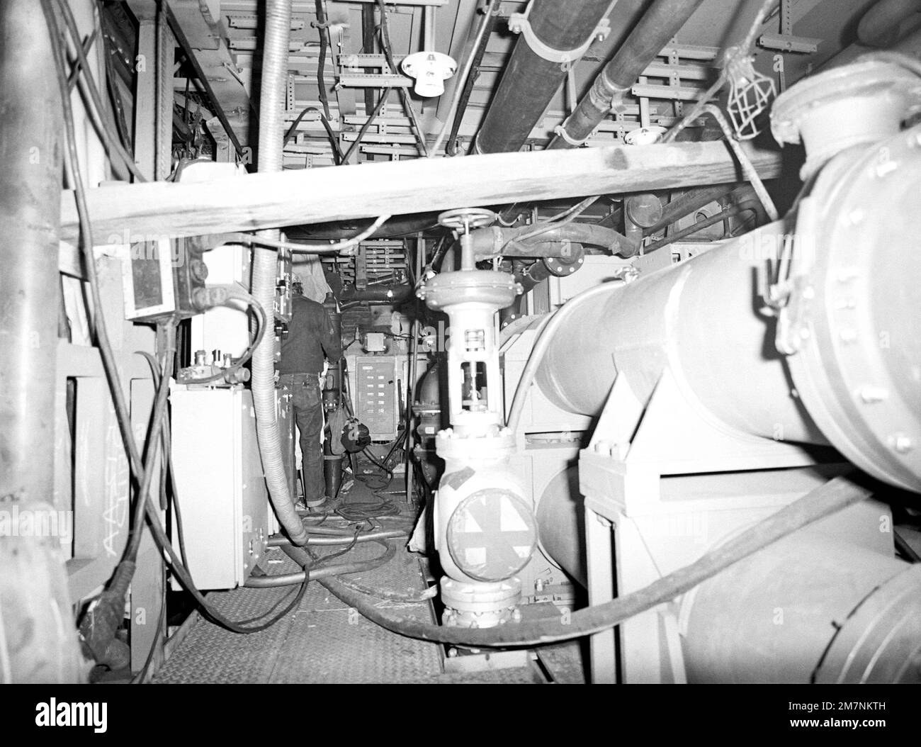 An interior view of the engine room on the guided missile frigate CLARK ...