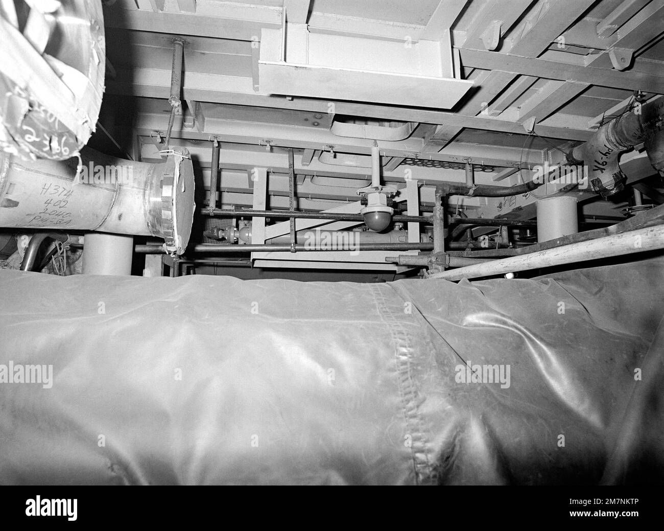 An interior view of auxiliary machine room No. 1 on the guided missile ...