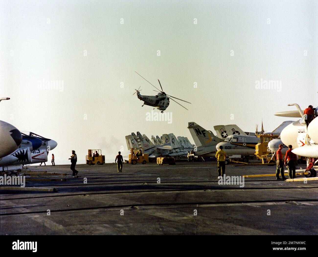 A right side view of an SH-3 Sea King helicopter in flight above the ...
