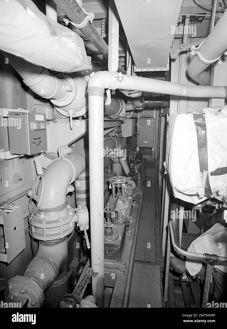 An interior view of auxiliary machine room No. 1 on the guided missile ...