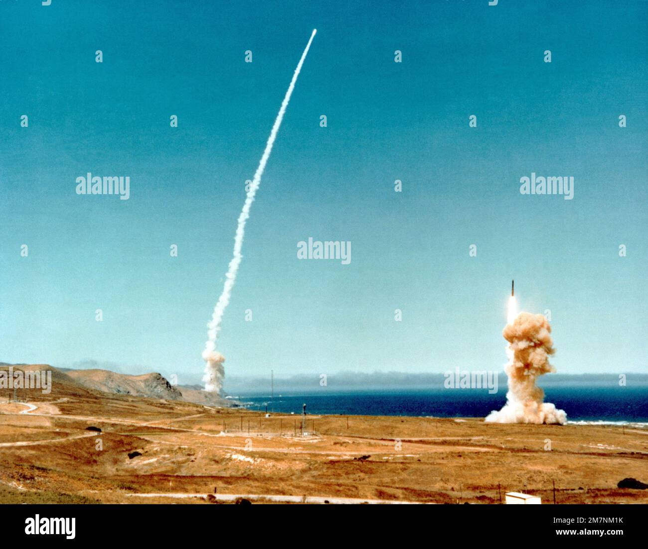 Two Minuteman III, intercontinental ballistic missiles are launched ...