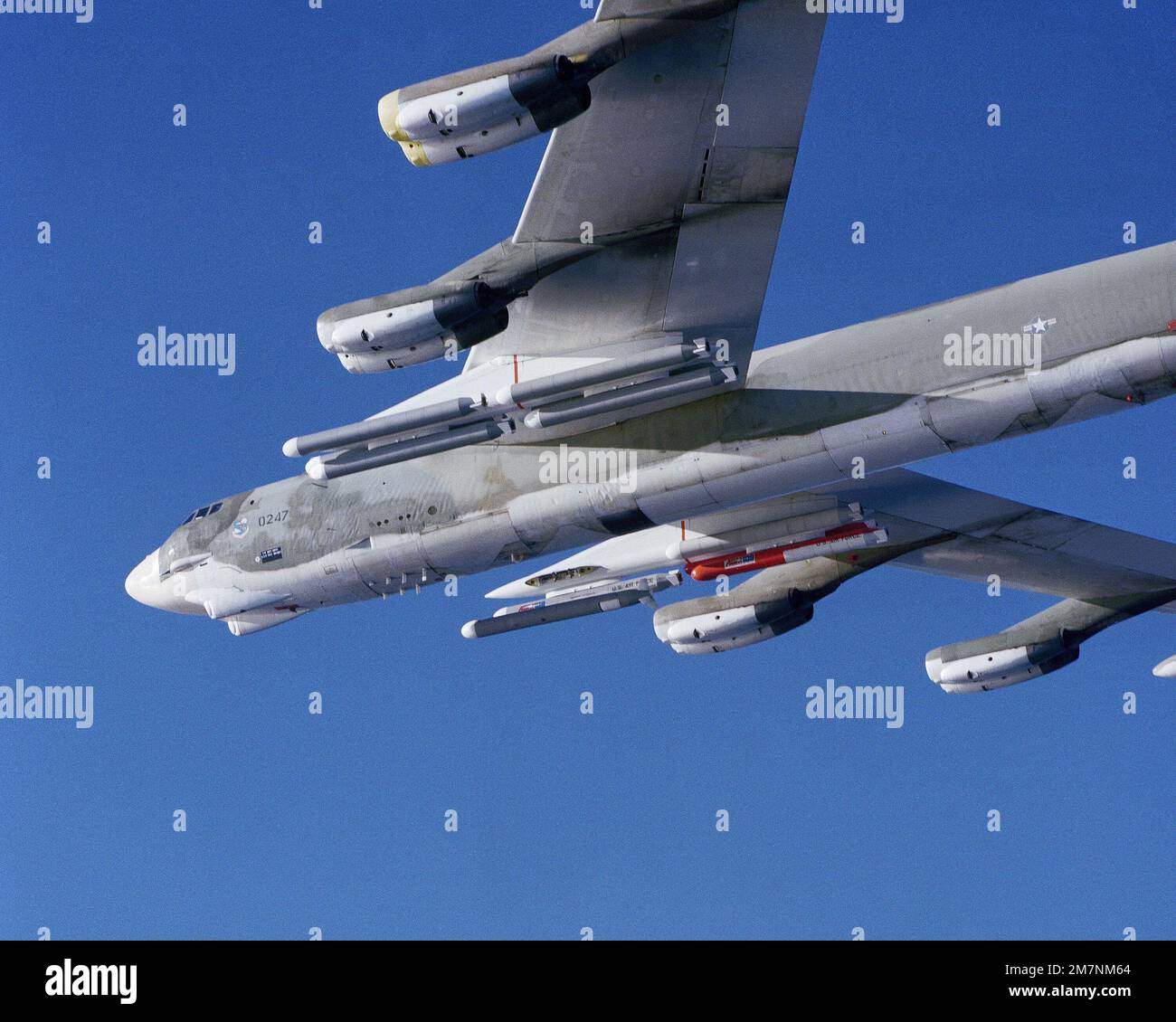 A left side view of a B-52 Stratofortress aircraft carrying AGM-109 ...