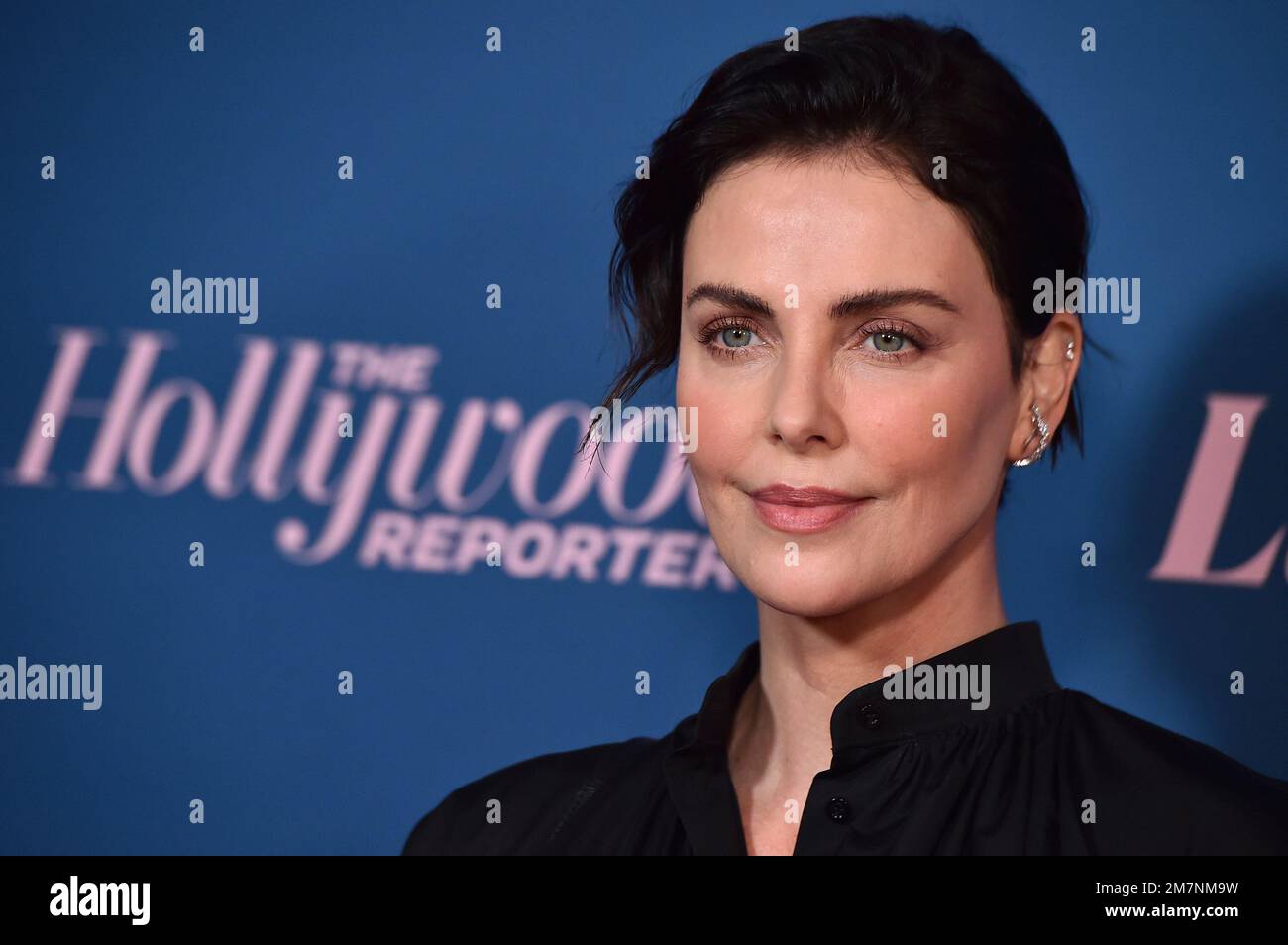 Charlize Theron arrives at The Hollywood Reporter's Women in ...