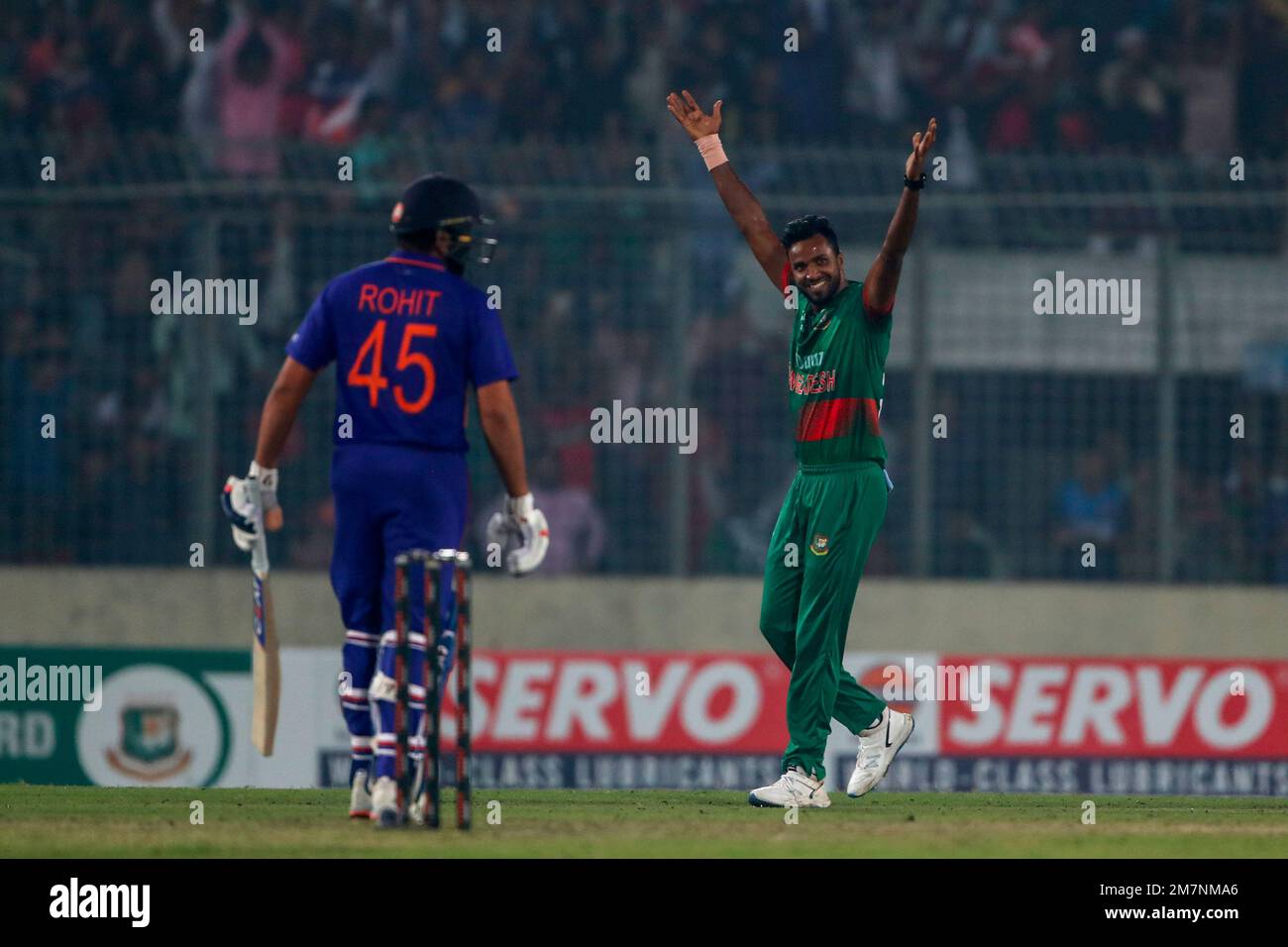 Bangladesh's Ebadot Hossain, right celebrates the wicket of India's ...