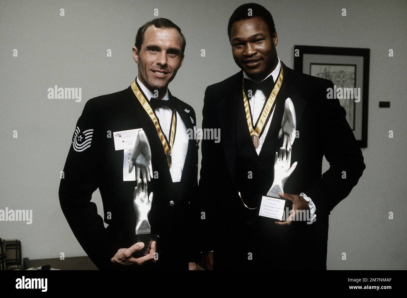 MSGT Wayne L. Fisk stands with Larry Holmes, the current heavy-weight ...