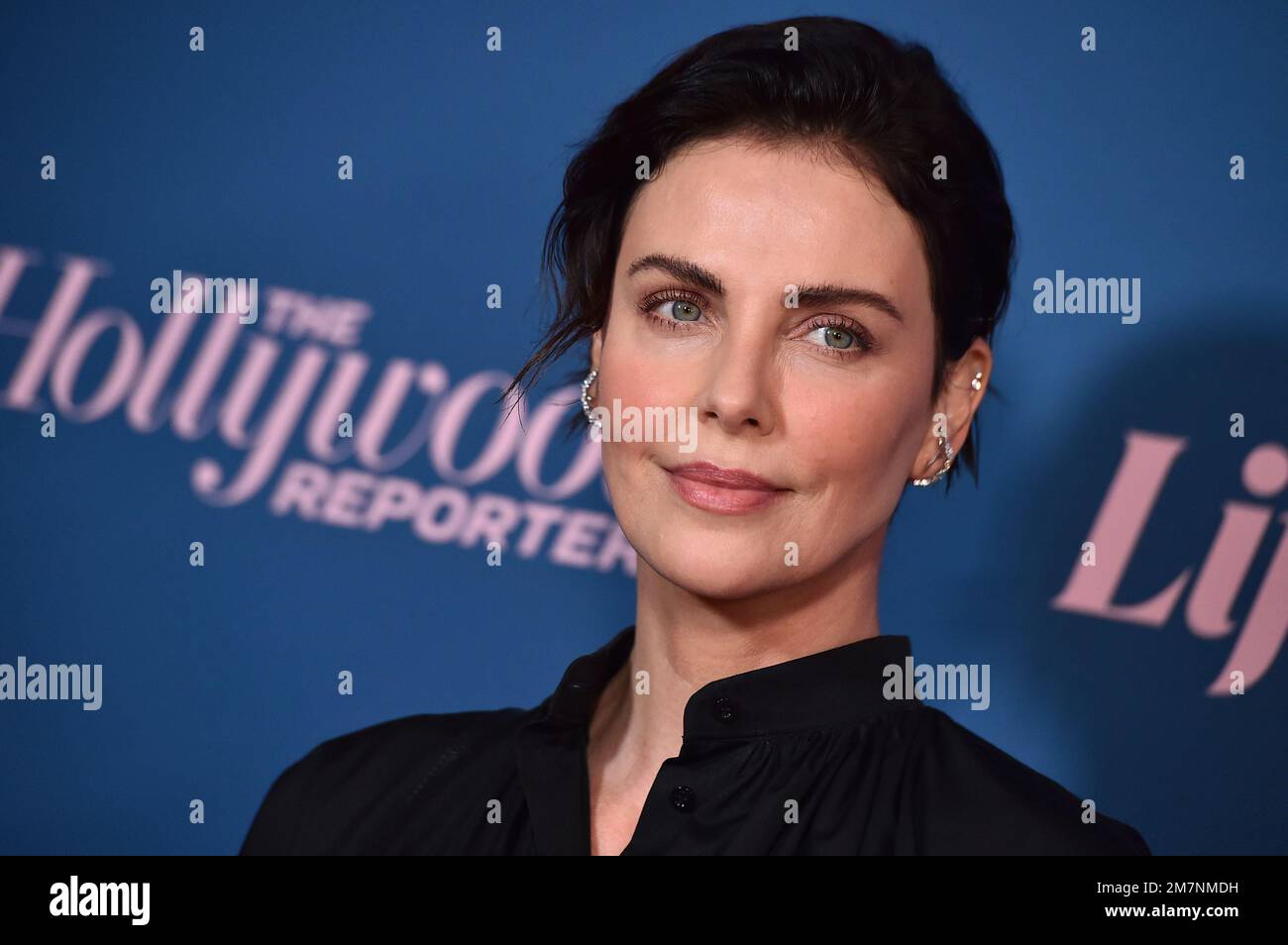 Charlize Theron arrives at The Hollywood Reporter's Women in ...