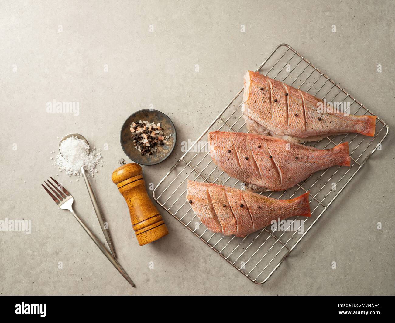 Fresh red rockfish on the grill Stock Photo - Alamy