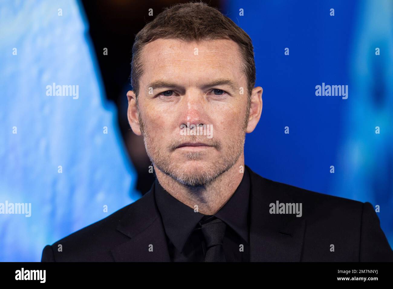 Sam Worthington poses for photographers upon arrival at the World ...
