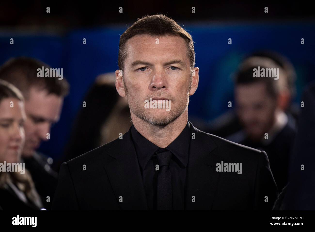 Sam Worthington poses for photographers upon arrival at the World ...