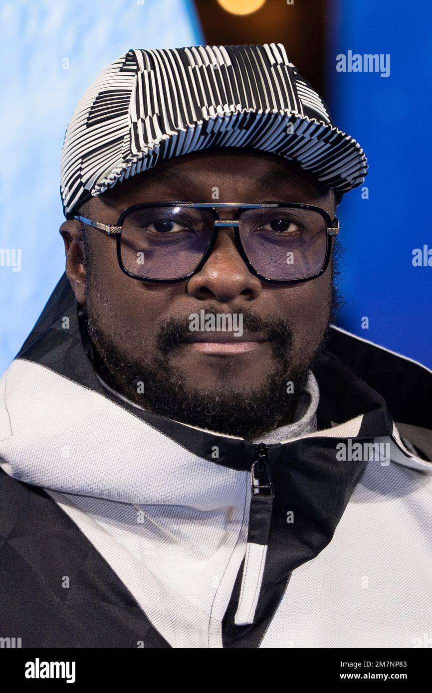 William Adams, a.k.a. Will.i.am poses for photographers upon arrival at ...