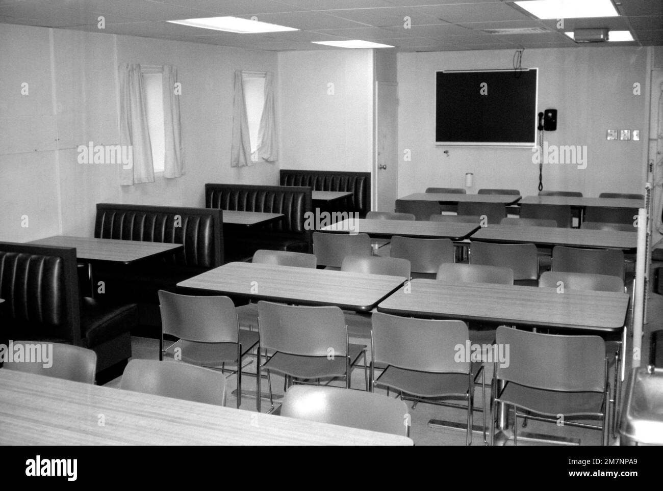 The crew mess aboard a large non-self-propelled repair, berthing and ...