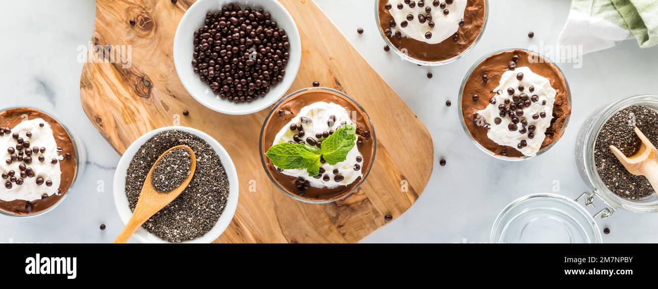 Top down narrow view of chocolate mousse chia pudding, ready for eating ...