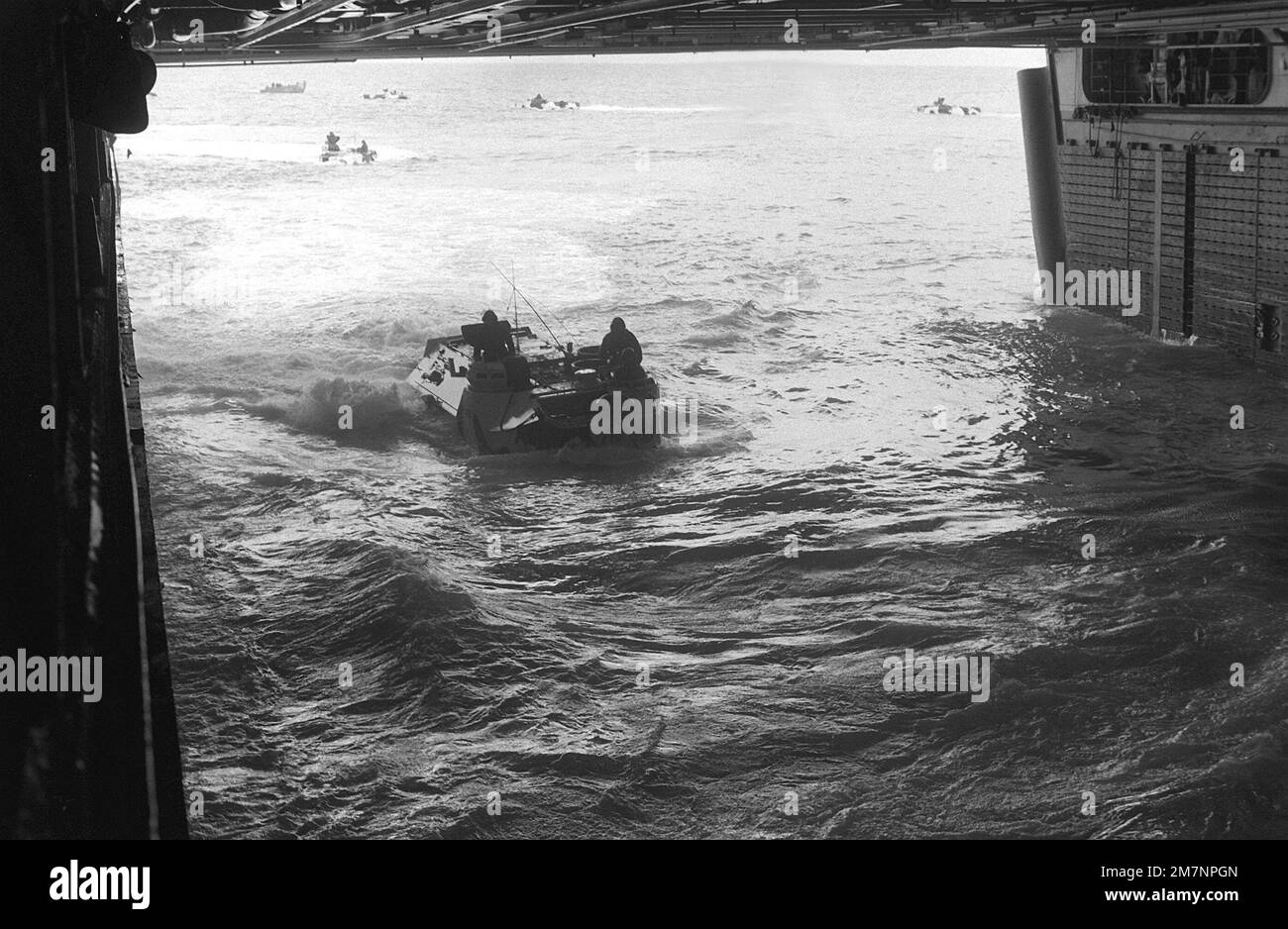 LVTP-7 tracked landing vehicles depart the well deck of the amphibious ...