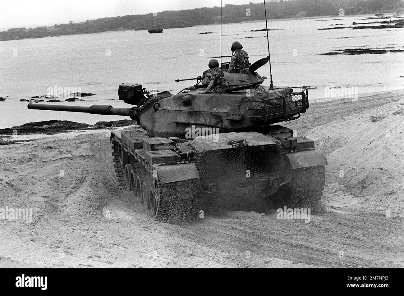 An M-60A1 tank crew from Charlie Company, 1ST Tracked Vehicle Battalion ...