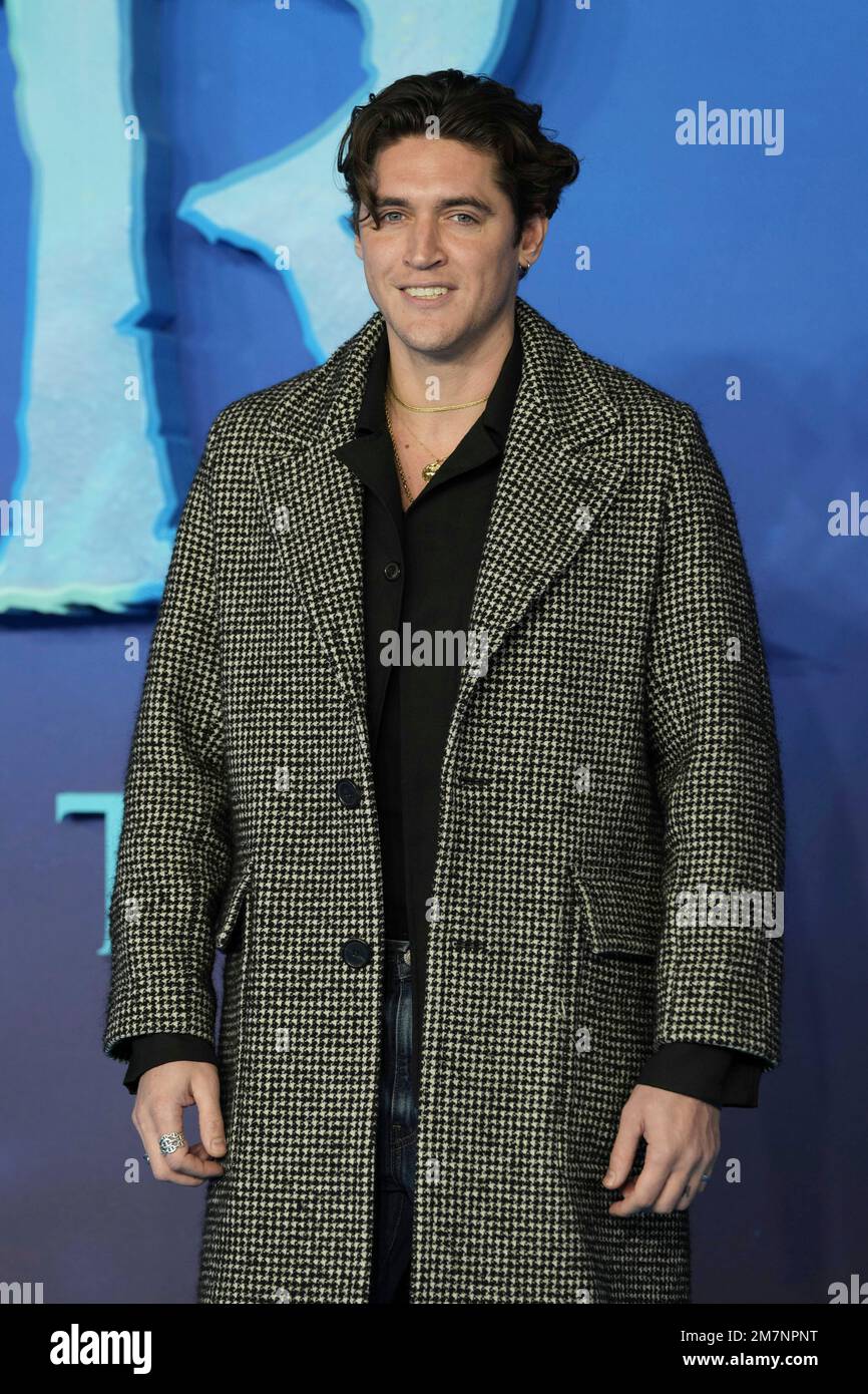 Isaac Carew poses for photographers upon arrival at the World premiere ...