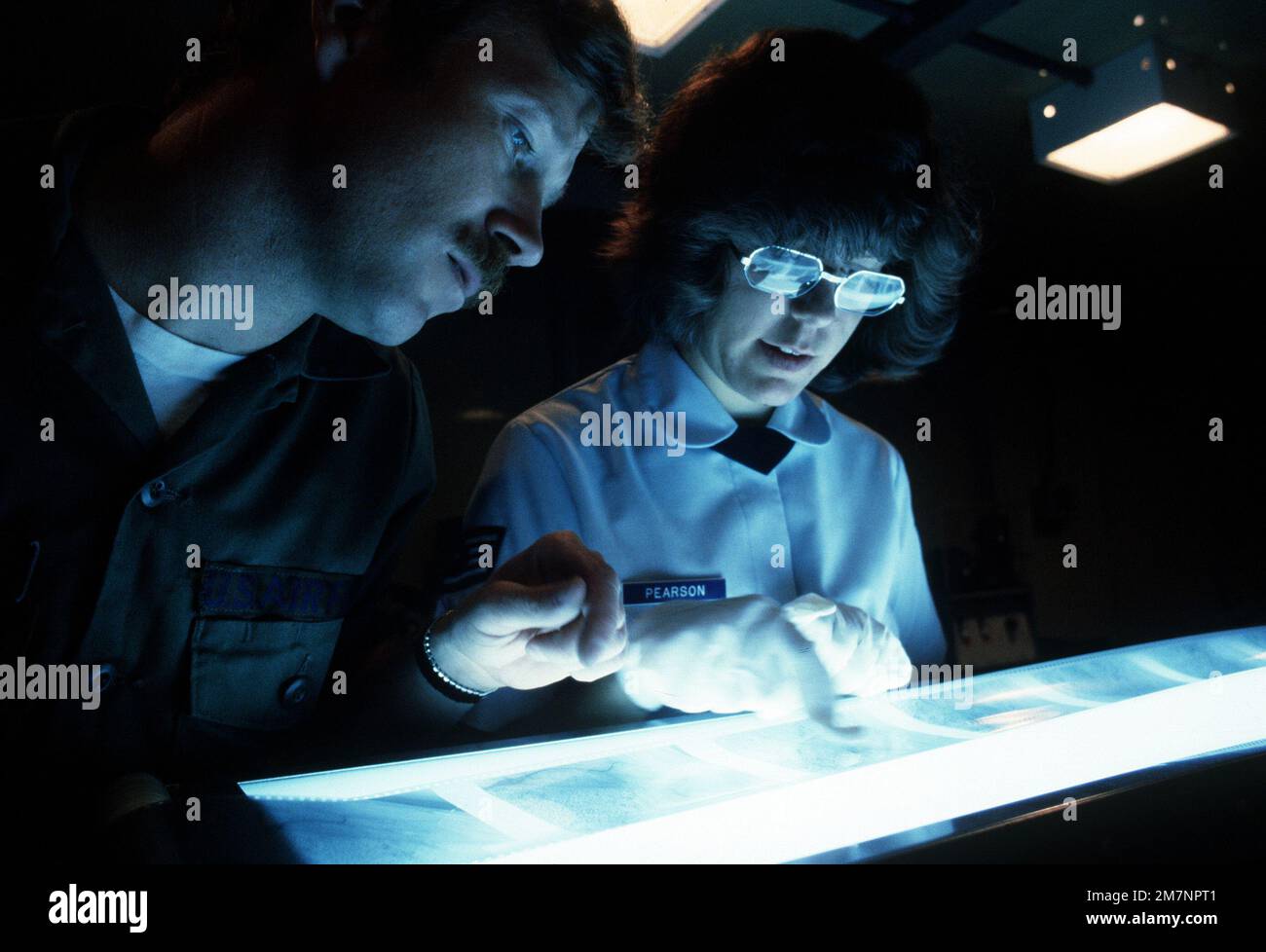 Reconnaissance photo interpreters MASTER SGT. Barclay A. Trehal and ...