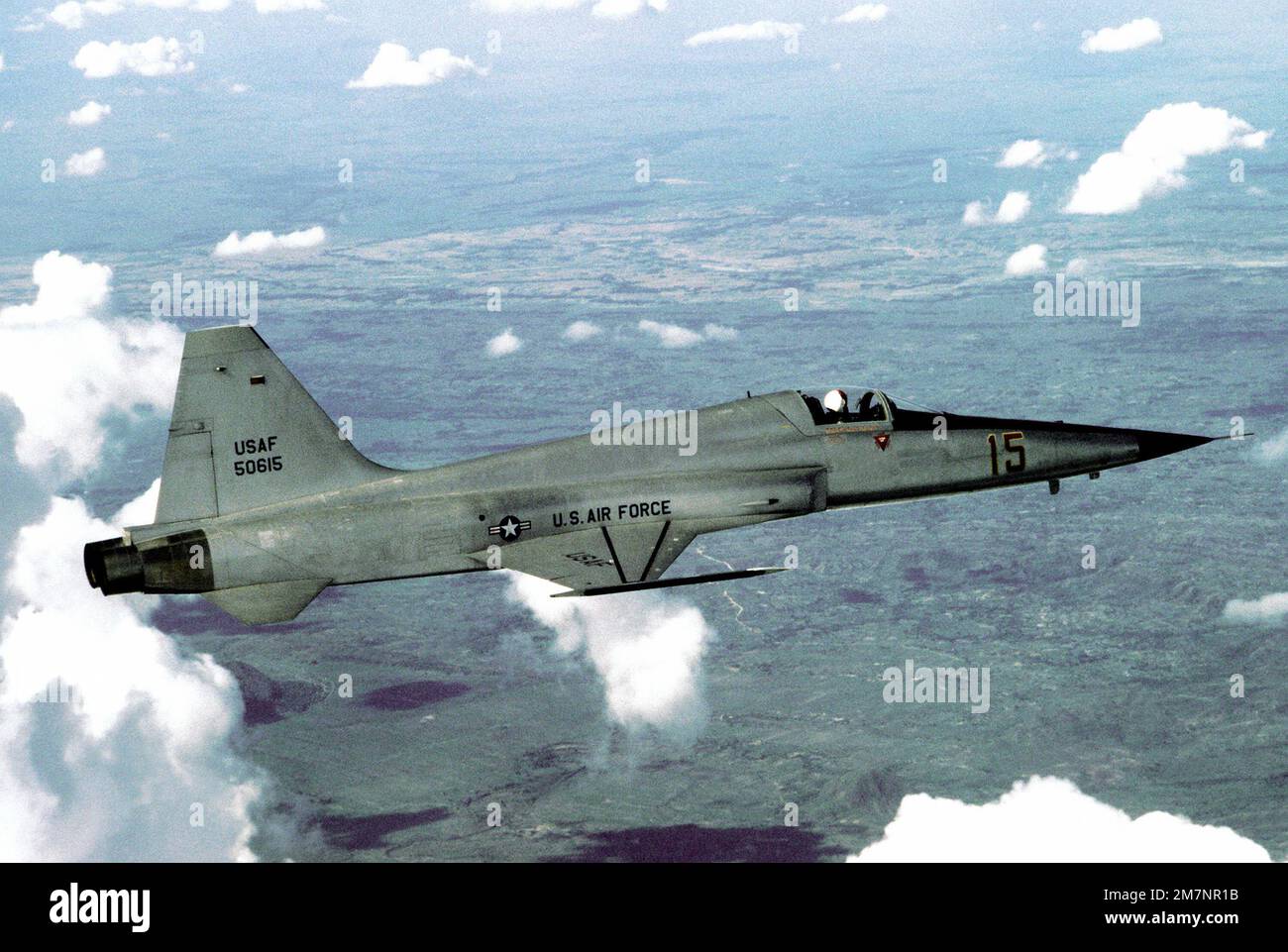 AN air-to-air right side view of an F-5E Tiger II aircraft. Country ...