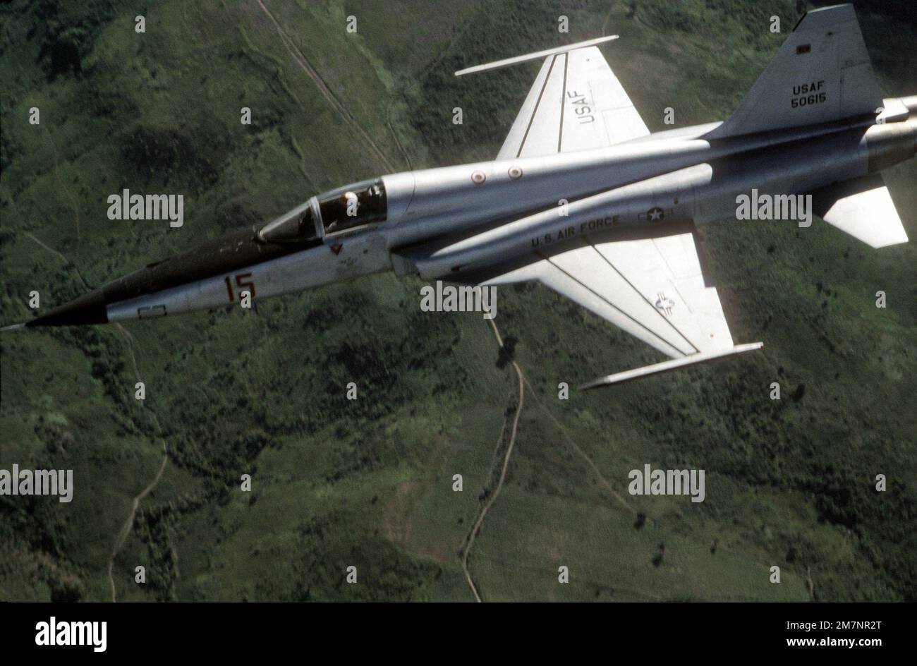 AN air-to-air overhead view of an F-5E Tiger II aircraft. Country ...